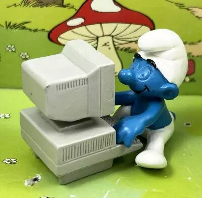 The Smurfs - Schleich - 40249 Smurf with computer (no painted eyes)